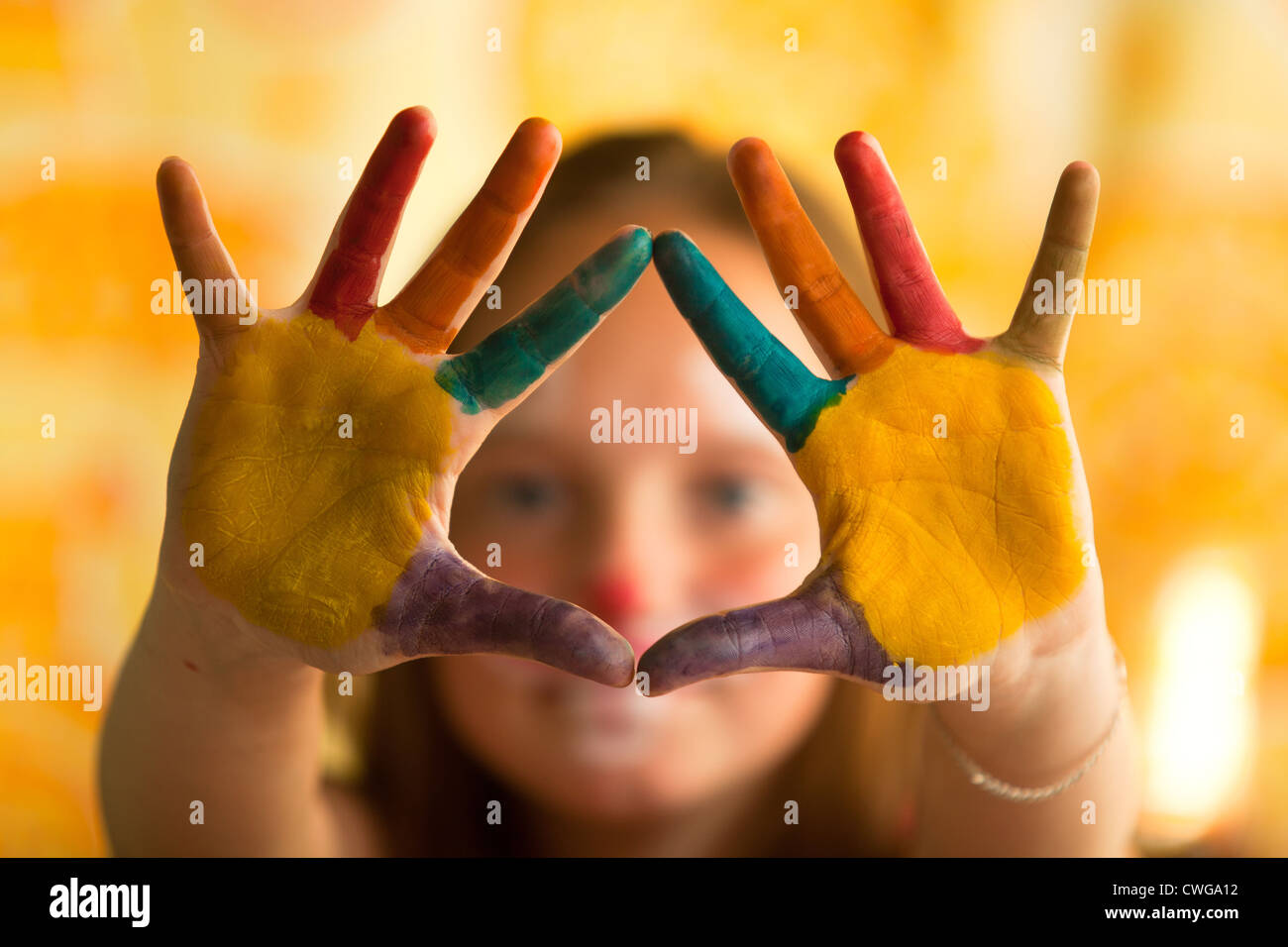 Child painted hand face hi-res stock photography and images - Alamy