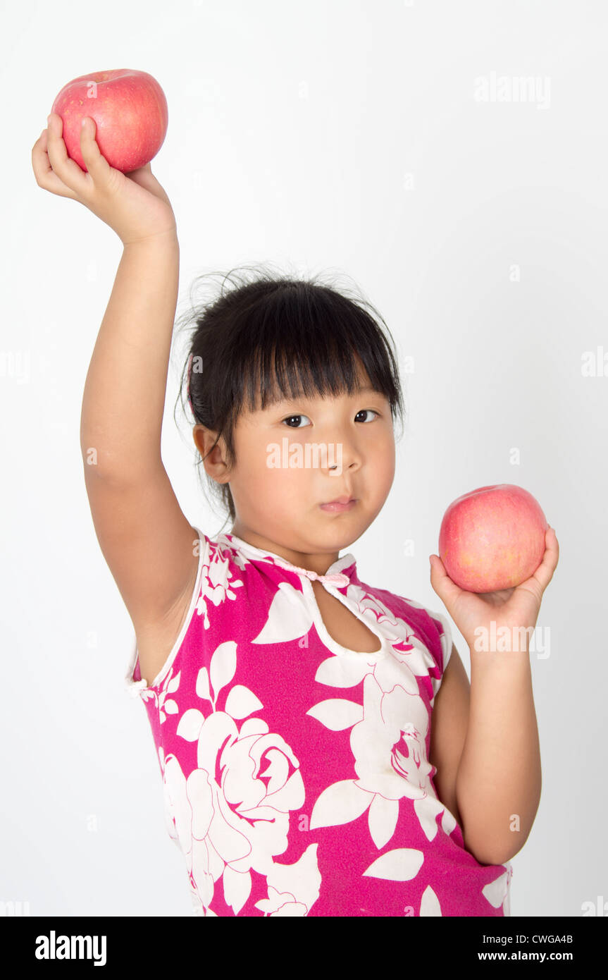 Take the apple's little girl Stock Photo - Alamy