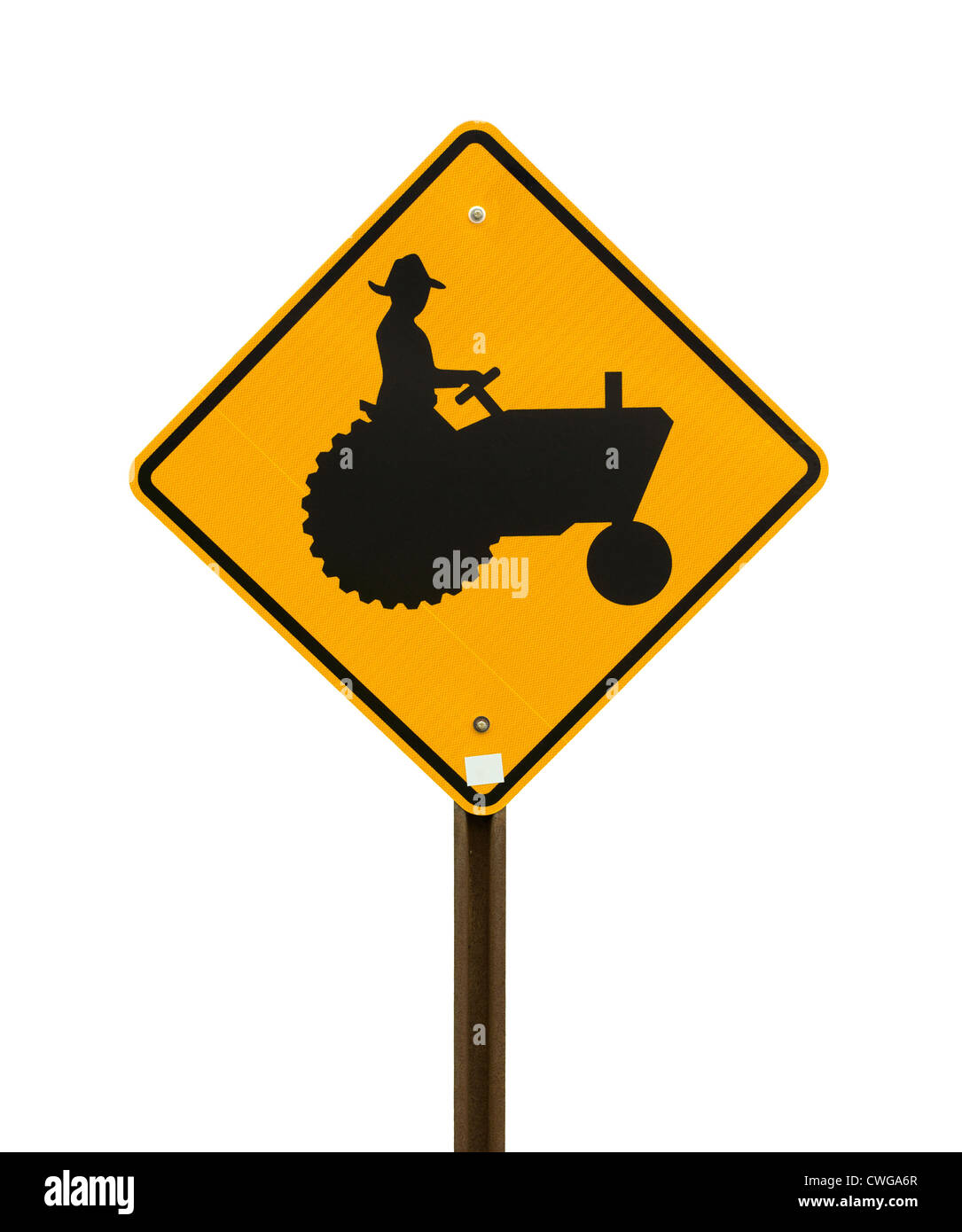 A bright yellow farm tractor sign on a white background Stock Photo - Alamy