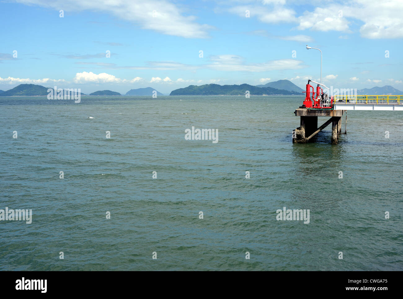 Oil refinery industrial port for loading Stock Photo - Alamy