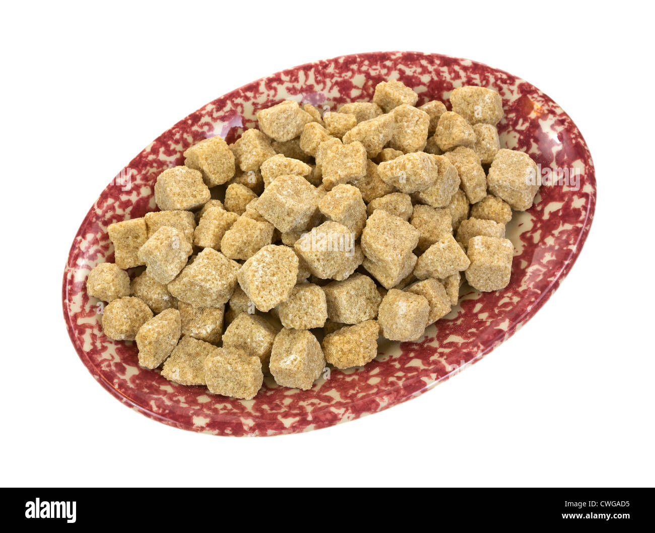 Raw sugar cubes on small plate Stock Photo - Alamy