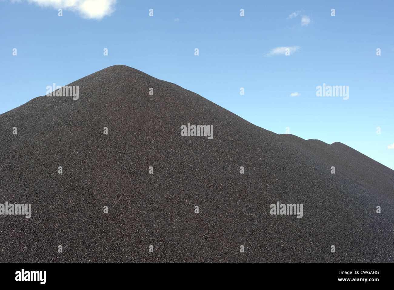 Black gravel mound mountain for concrete making Stock Photo - Alamy