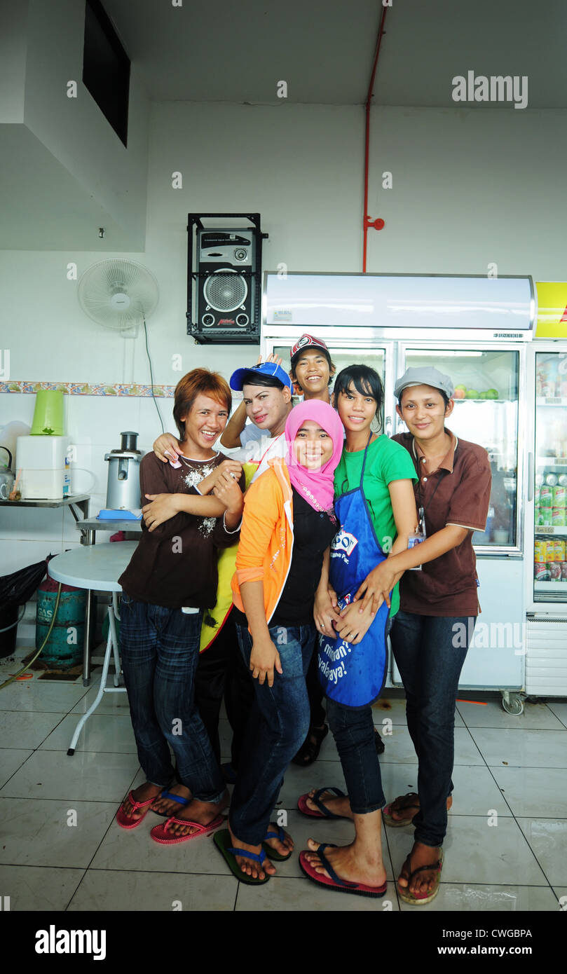 Malaysia, Borneo, Sandakan, young locals posing for photo Stock Photo ...