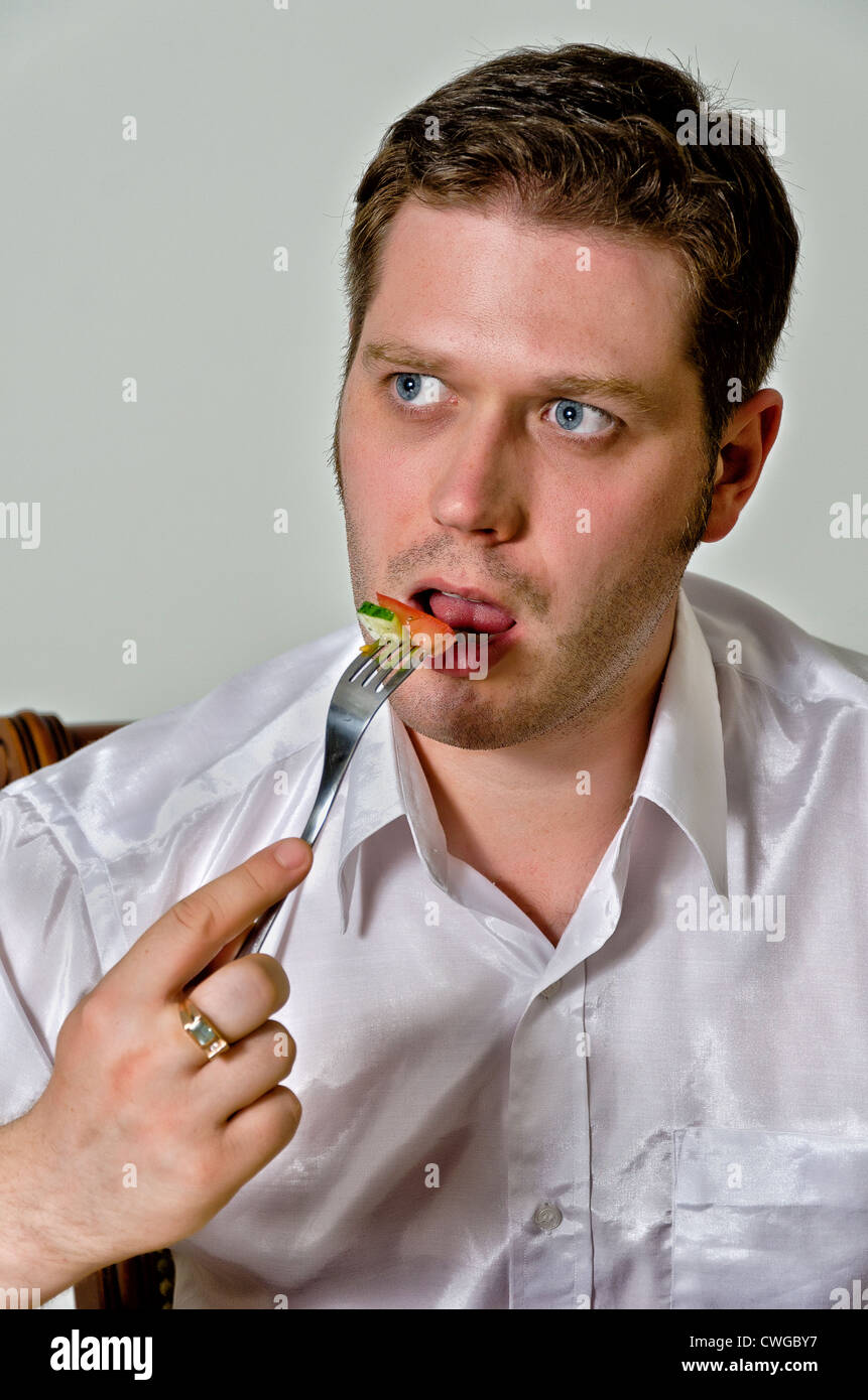 Eating vegetables and close up mouth hi-res stock photography and ...