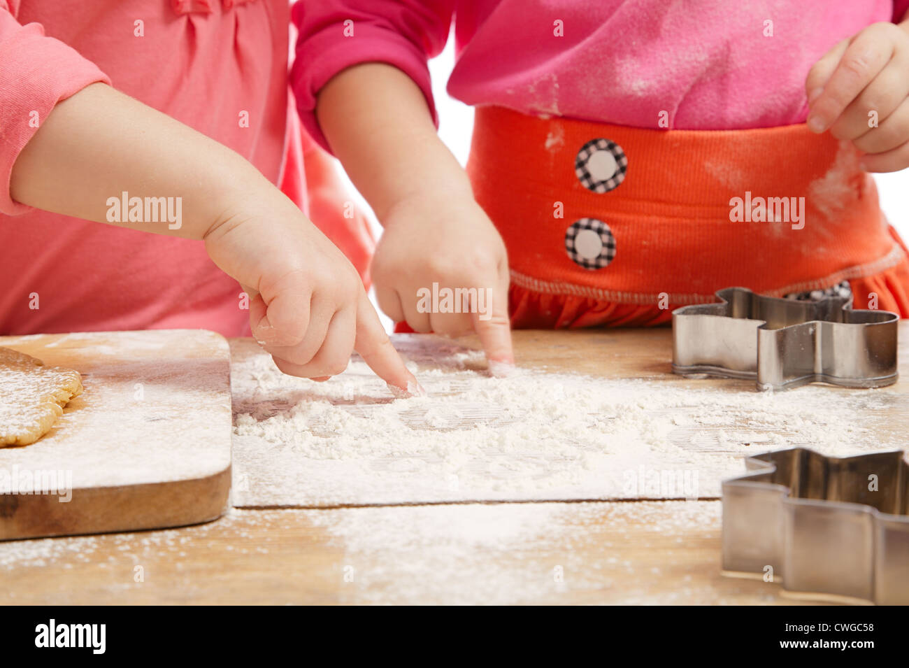 little girls baking and having fun, hands only Stock Photo - Alamy