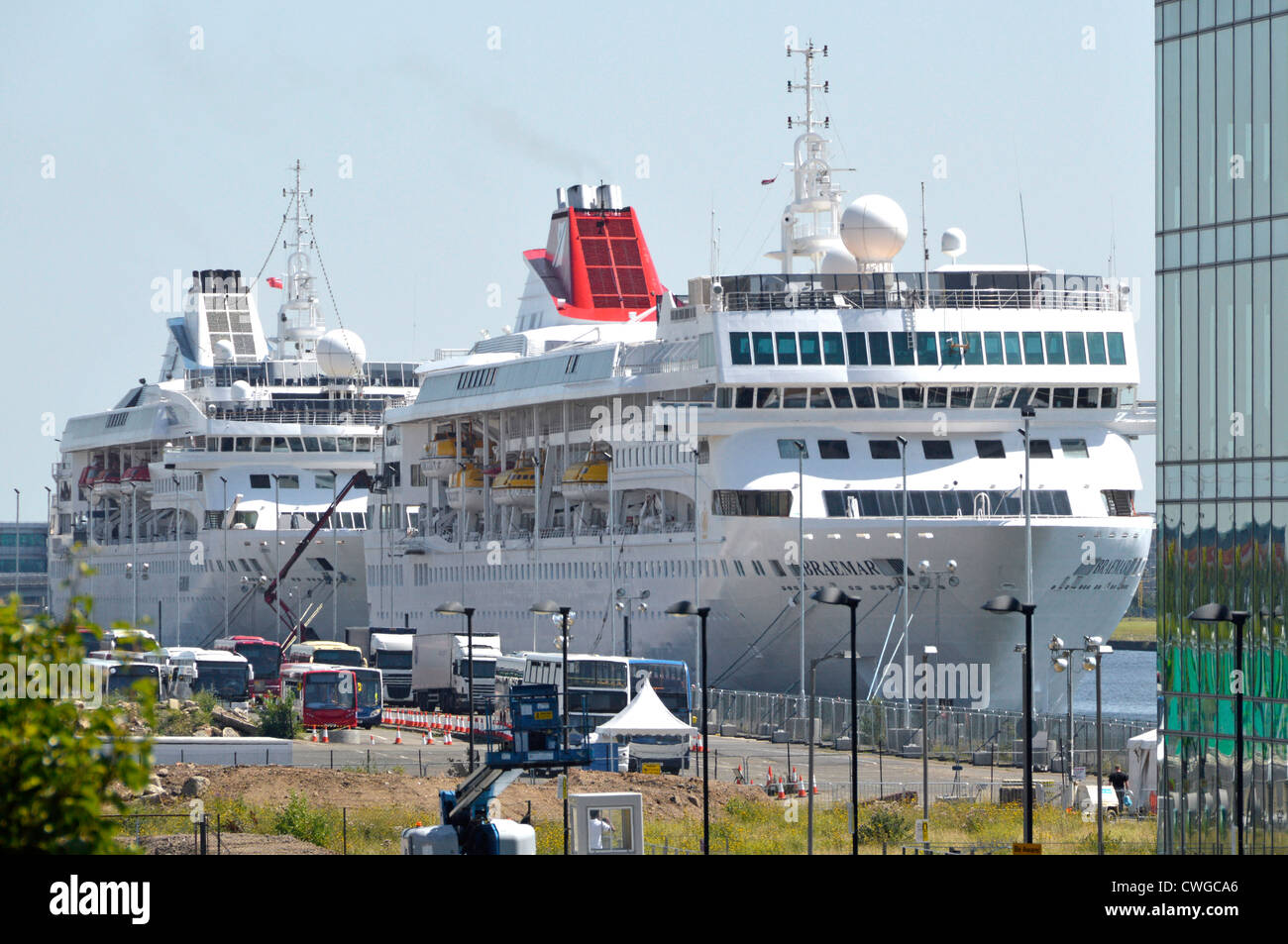 Two cruise liners (Fred Olsen Braemar at front) moored at Royal Docks ...