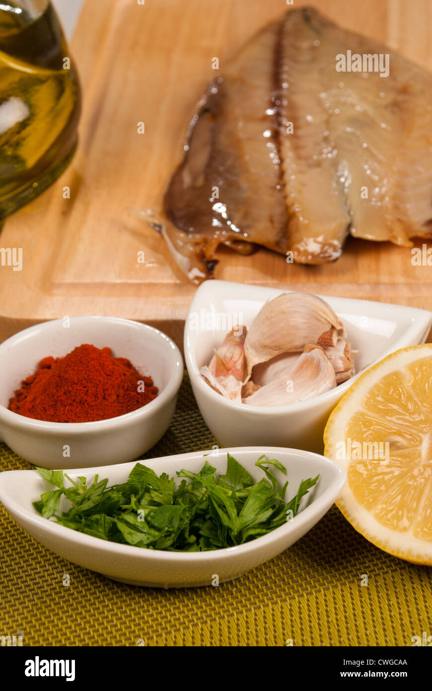 A dried mackerel about to be marinated Stock Photo - Alamy