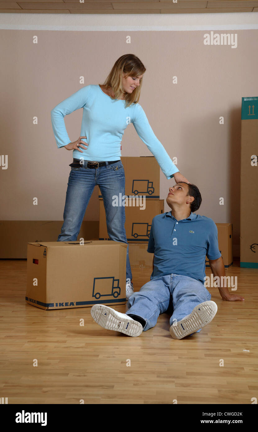 Young couple on moving Stock Photo - Alamy
