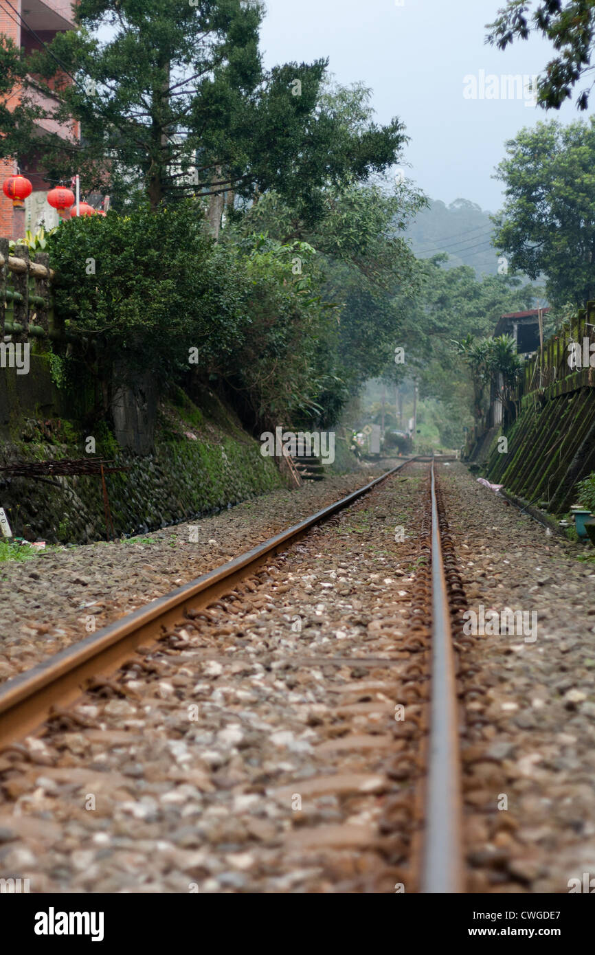 Looking down the tracks on the old train line in Pingxi near Taipei ...