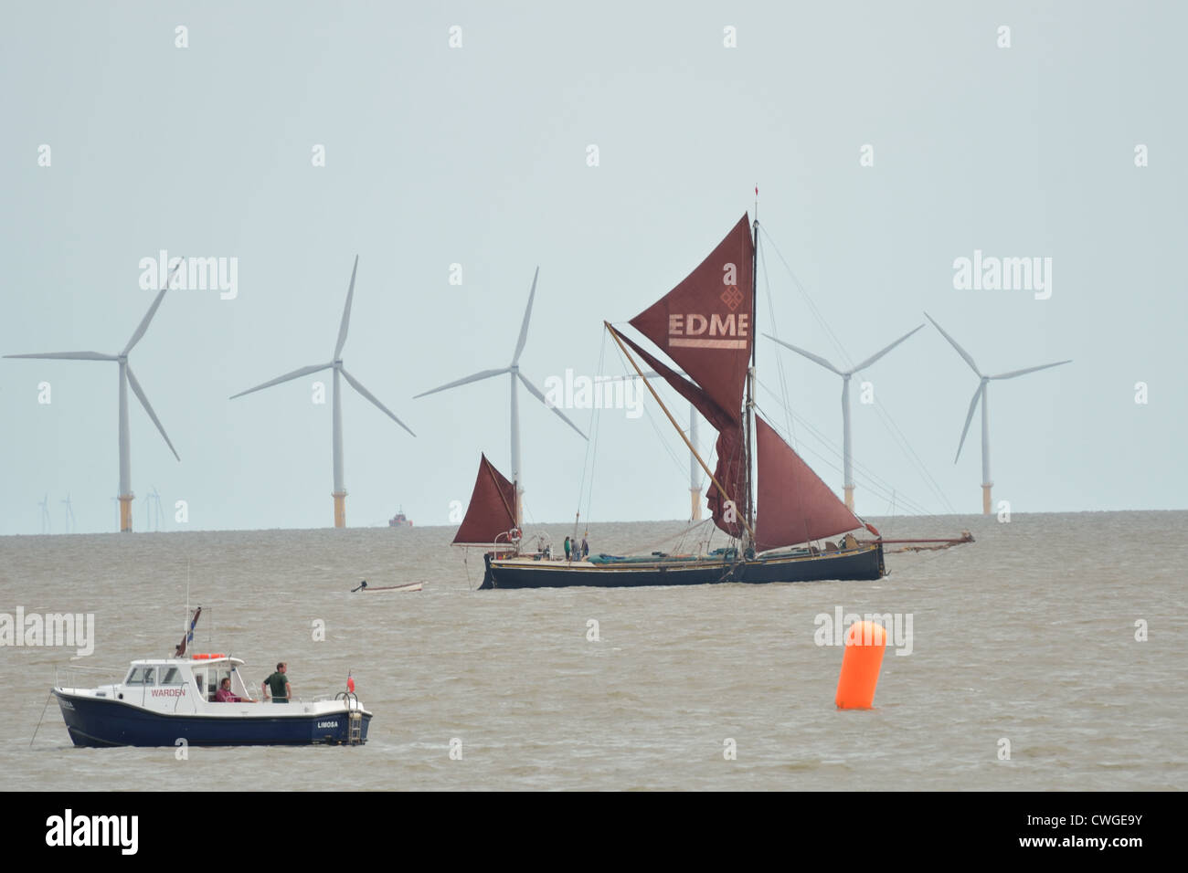 Wind farm at clacton on sea essex with boats Stock Photo - Alamy