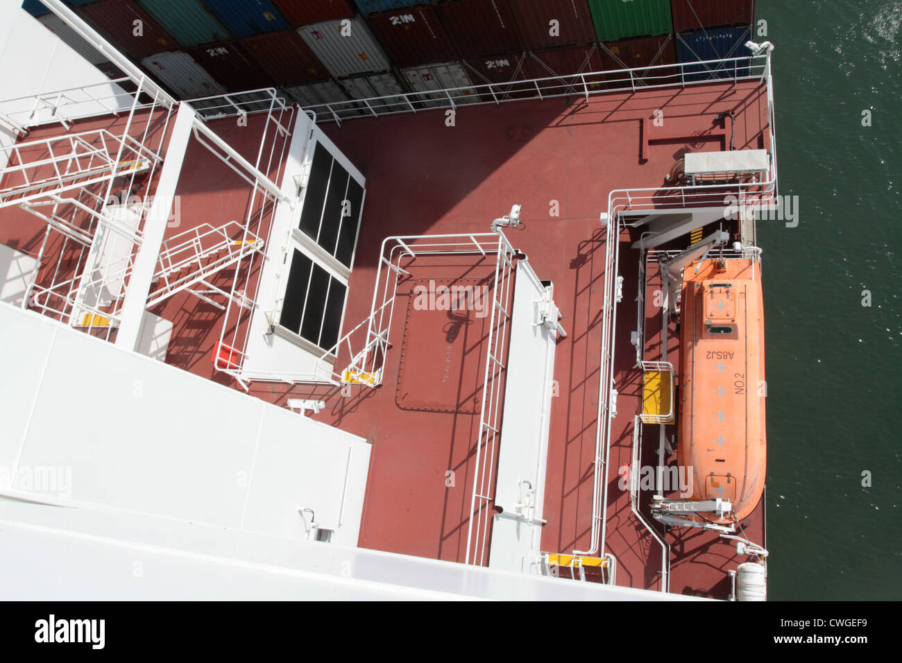Vertical view down the superstructure of a giant containership to the ...