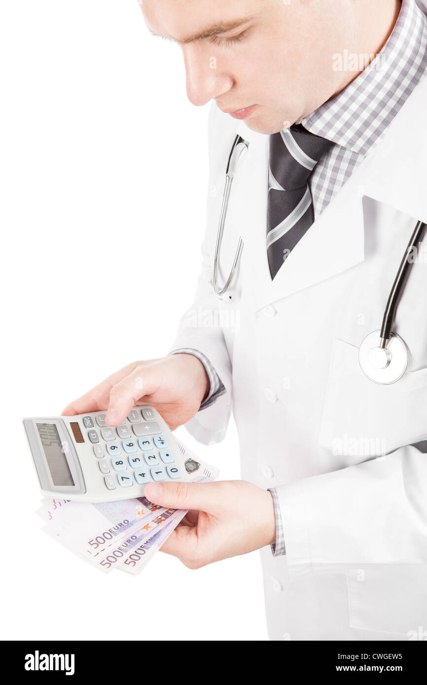 Doctor with money and calculator - studio shot Stock Photo - Alamy
