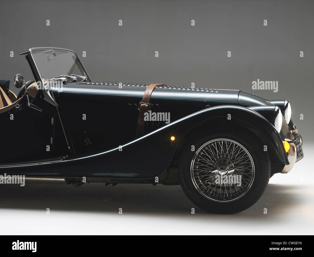 Bonnet of a Green Morgan Roadster 4/4 car with brown leather strap ...