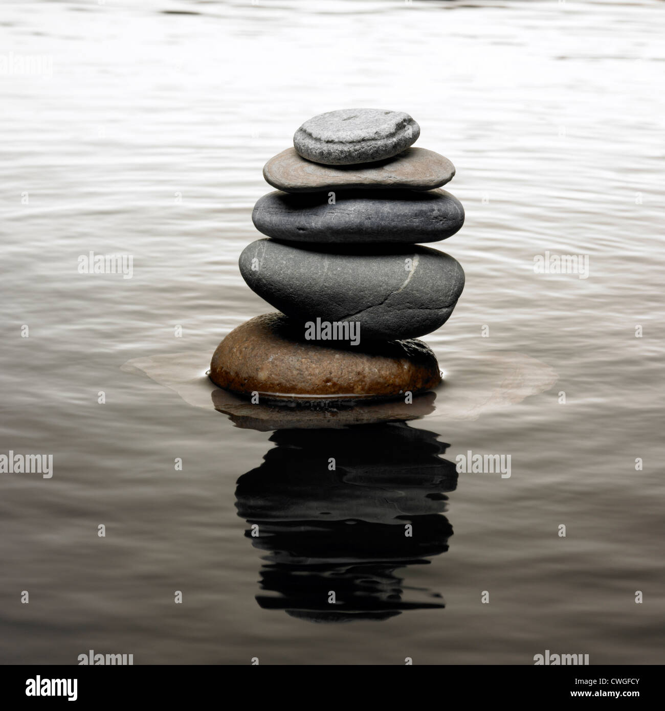 Stones on Water pebbles on beach Stock Photo - Alamy