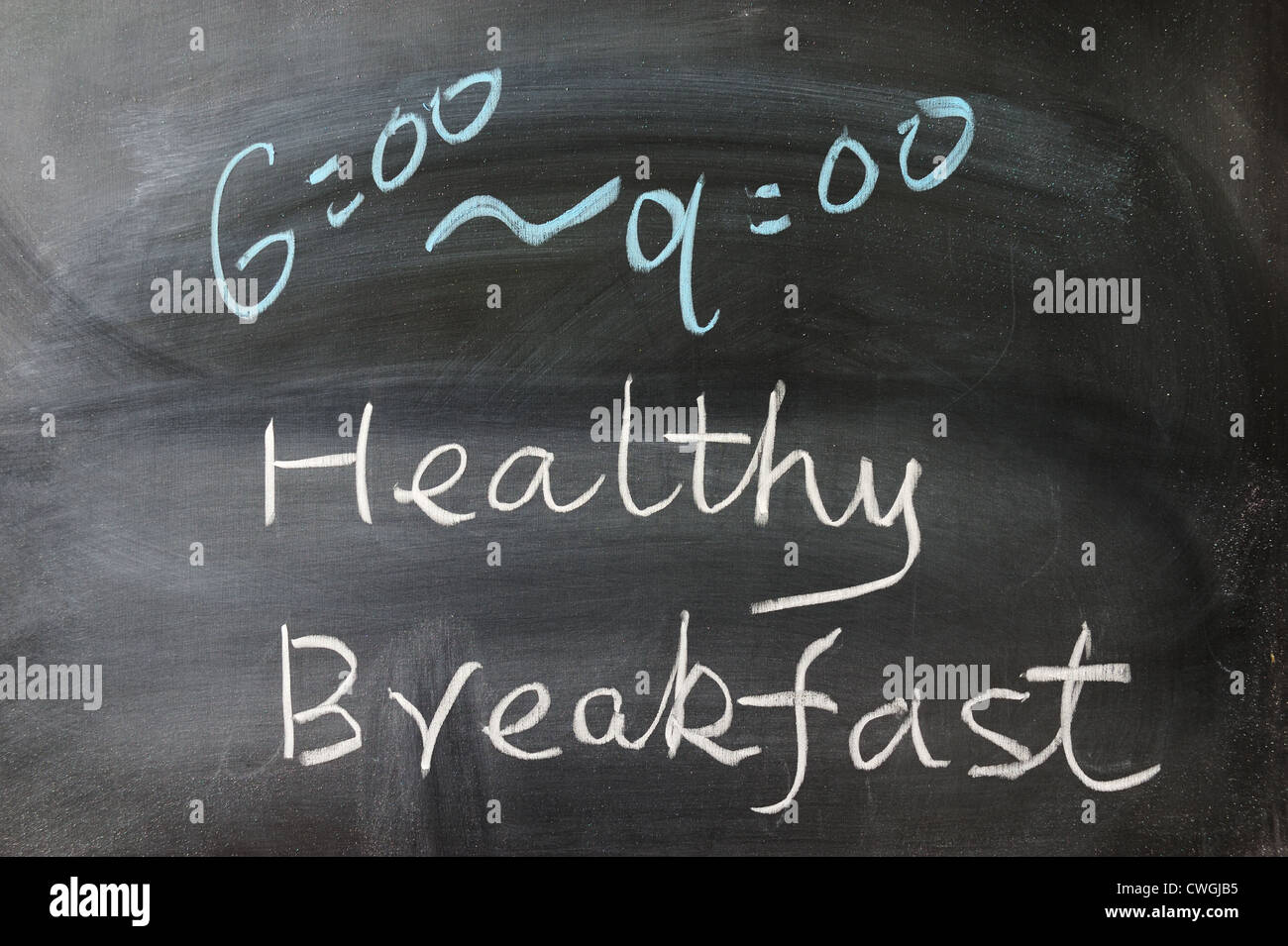 Healthy breakfast words written on the blackboard Stock Photo - Alamy