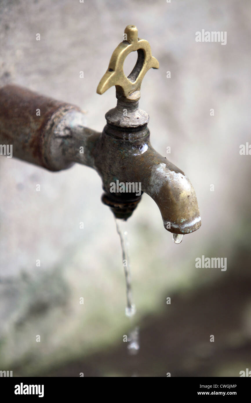Symbol photo, leaky faucet Stock Photo - Alamy