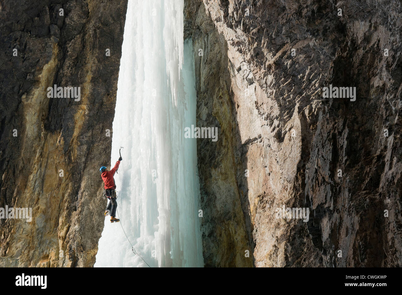 A man ice climbing a frozen waterfall, Silverton, Colorado Stock Photo ...