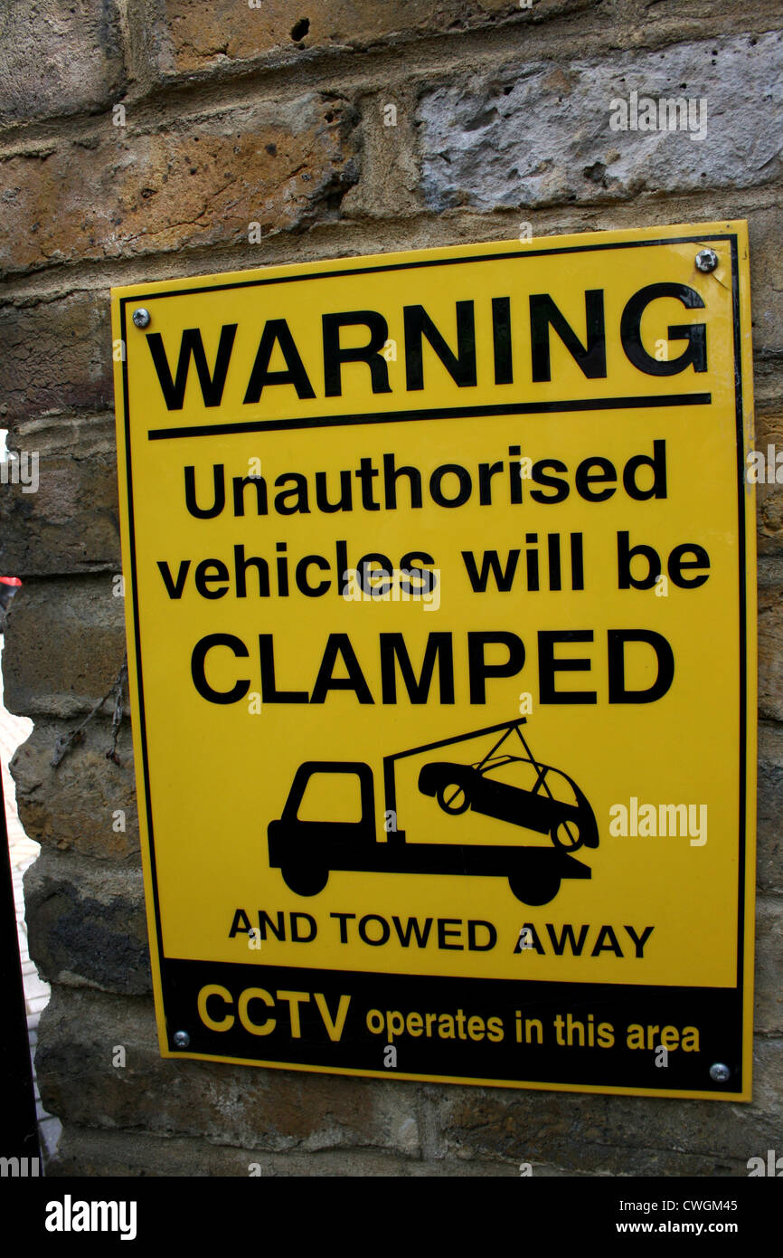 cctv warning wall sign bow london e3 uk 2012 Stock Photo - Alamy