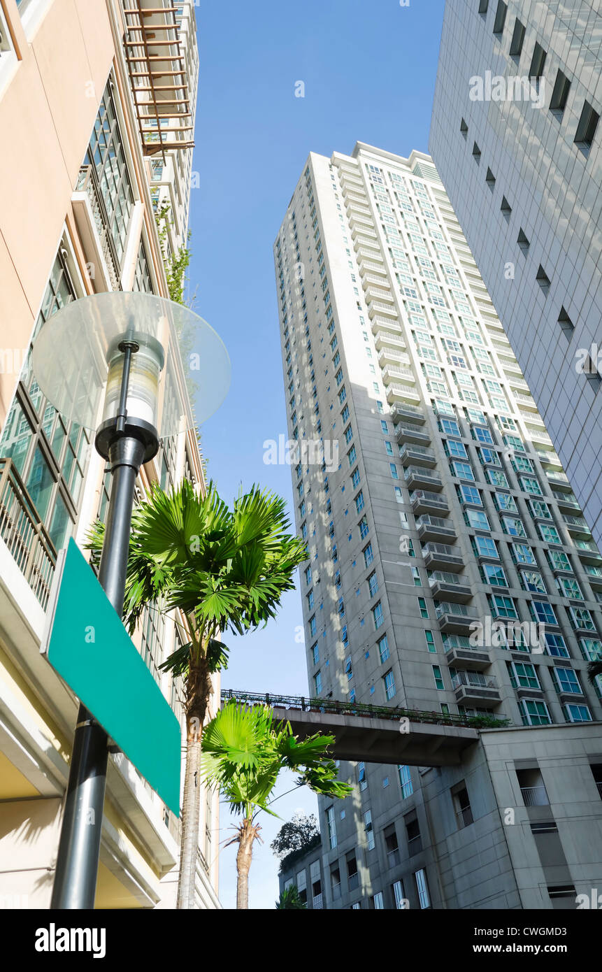 Worm's eye view of building with blank street sign at foreground Stock ...