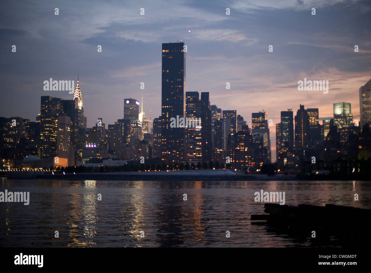 Mid Town of New York City seen from Long Island City at night Stock ...