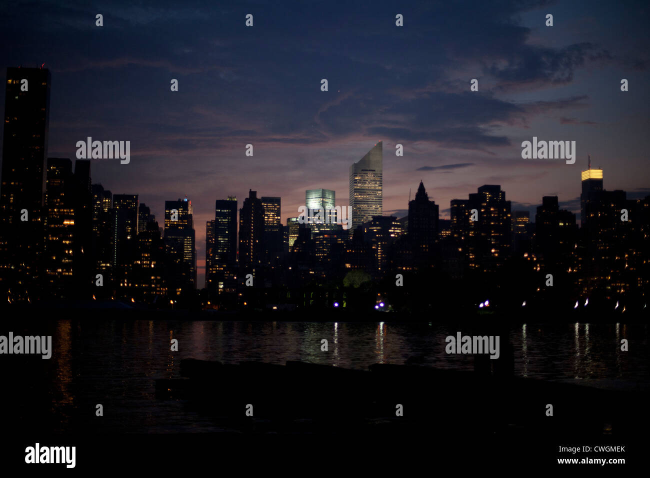 Mid Town of New York City seen from Long Island City at night Stock ...