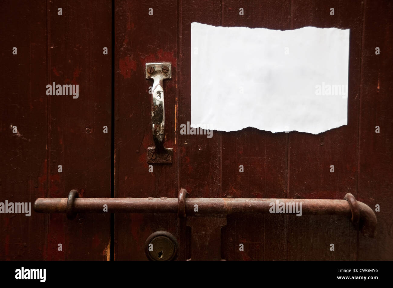 Close-up of heavy wooden door Stock Photo - Alamy