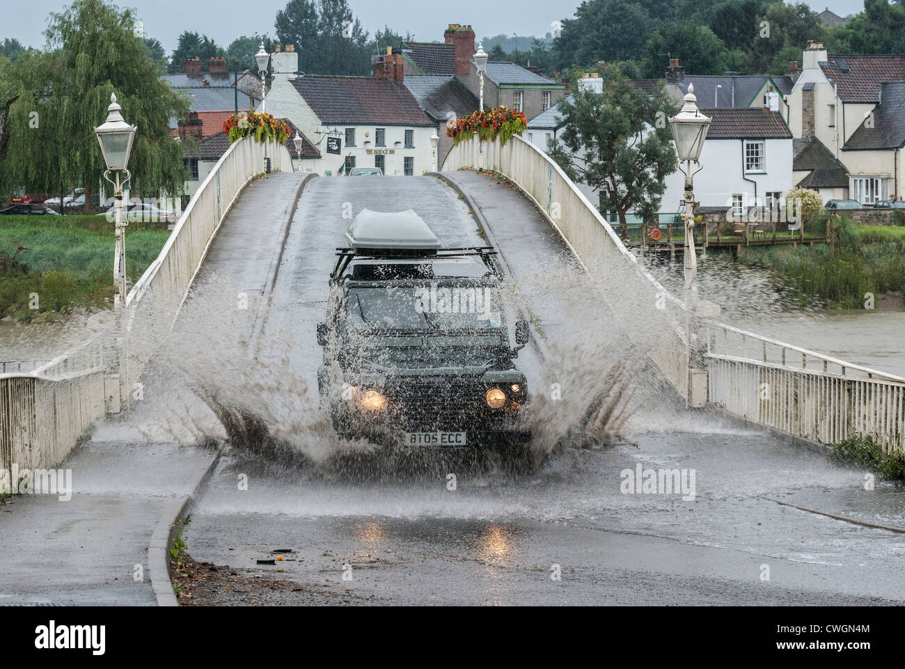 4X4 CAR DRIVING THROUGH SUMMER FLOOD ON OLD WYE BRIDGE IN CHEPSTOW. THE ...