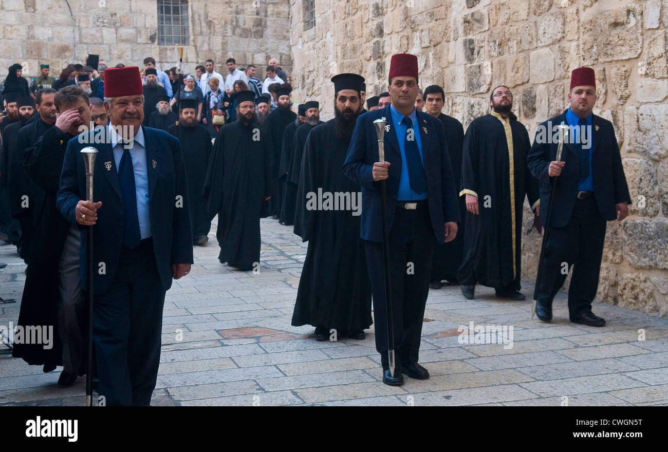 Greek Orthodox monks takes part in the Good Friday procession in ...