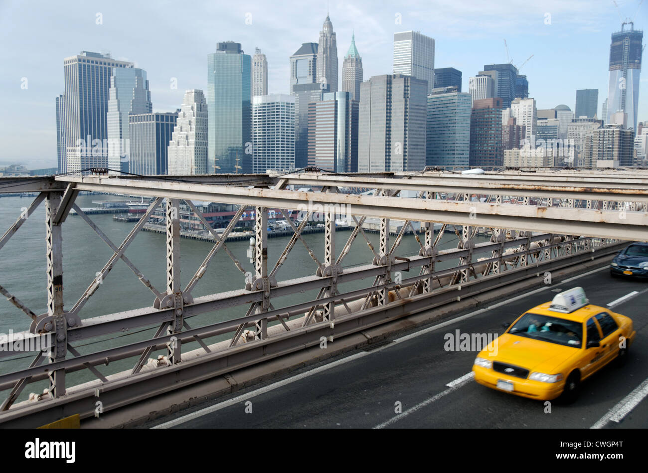 A cab in front of the skyline from Brooklyn bridge Stock Photo - Alamy