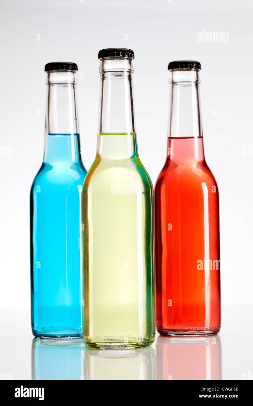 Exotic bottle alcohol cocktail isolated on white Stock Photo - Alamy