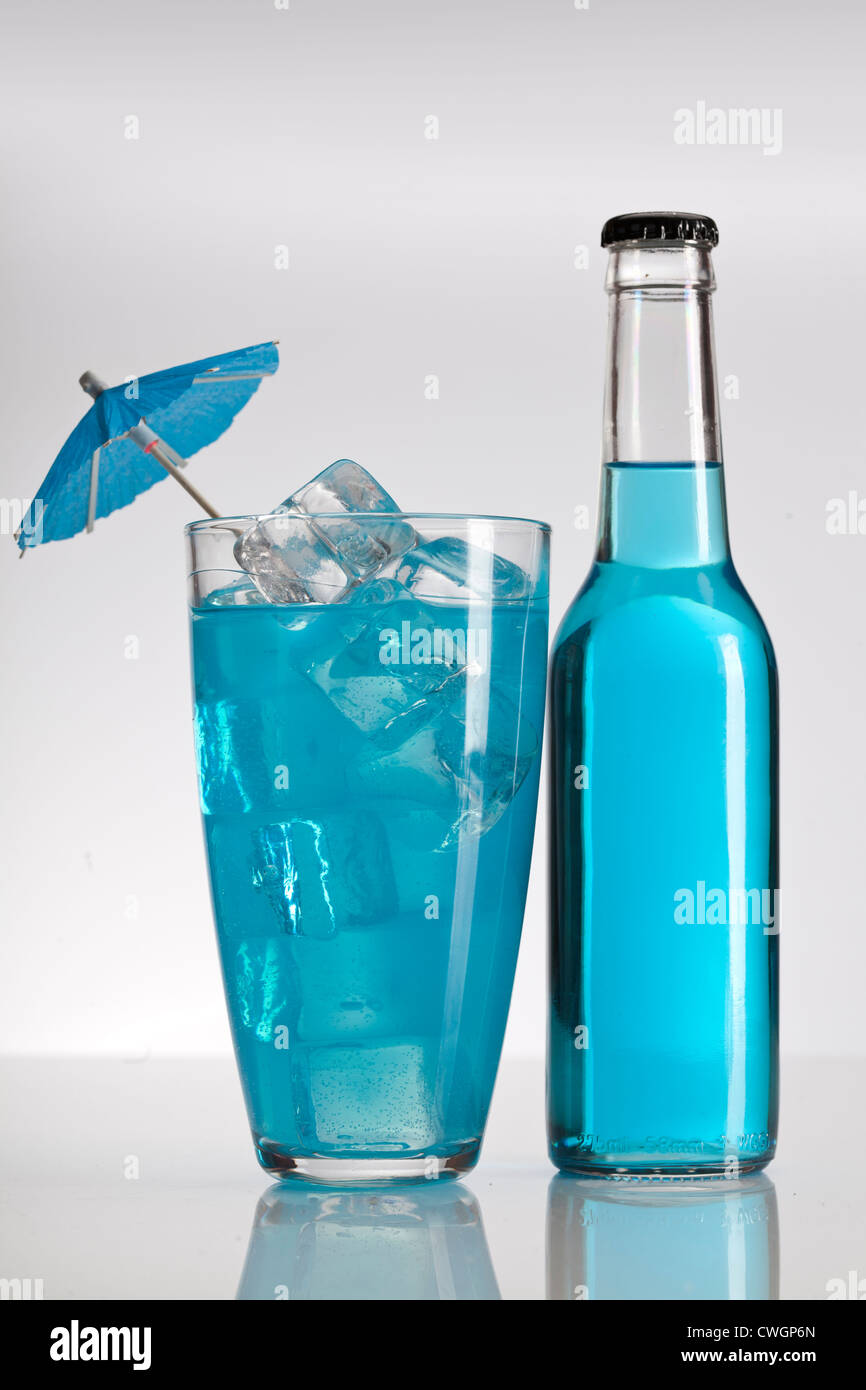 Exotic bottle alcohol cocktail isolated on white Stock Photo - Alamy