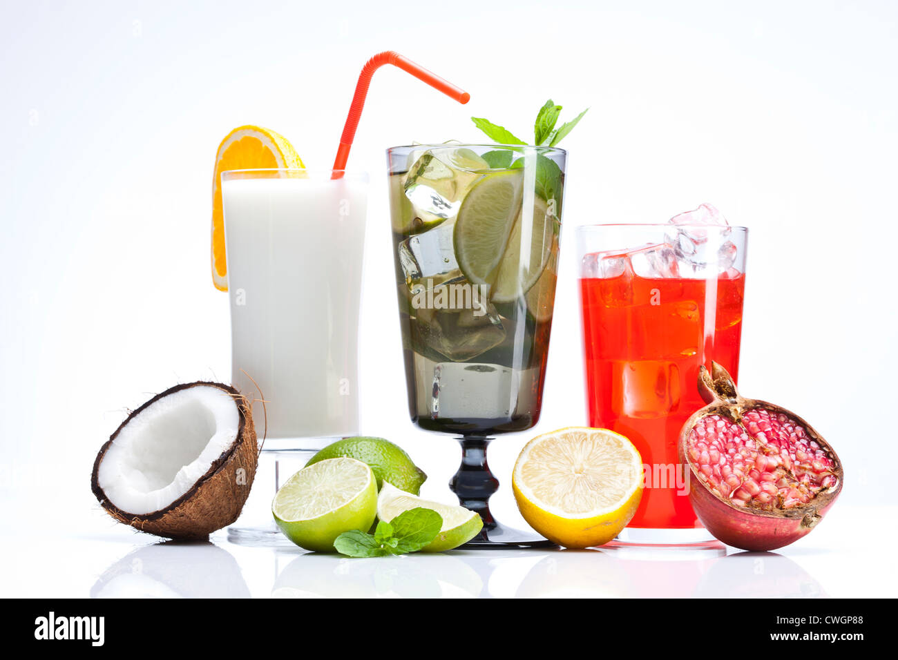 Exotic alcohol drinks set with fruits isolated on white background ...