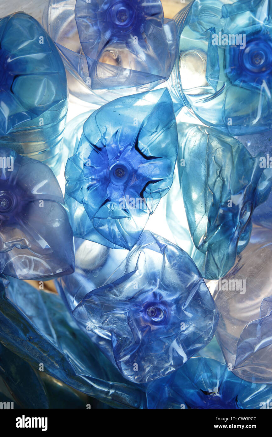 several blue empty crushed plastic bottles Stock Photo - Alamy
