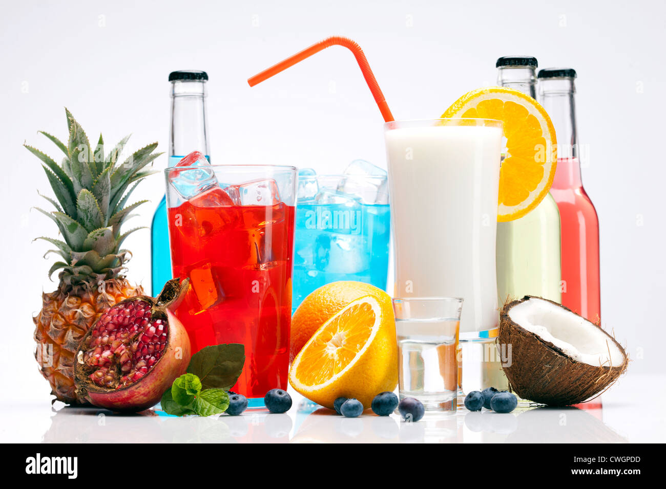 Exotic alcohol drinks set with fruits isolated on white background ...