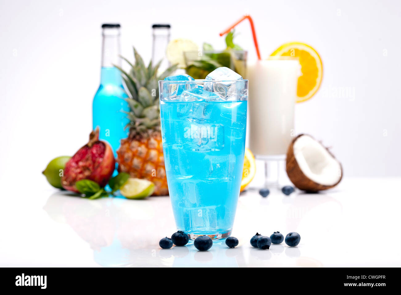 Exotic alcohol drinks set with fruits isolated on white background ...