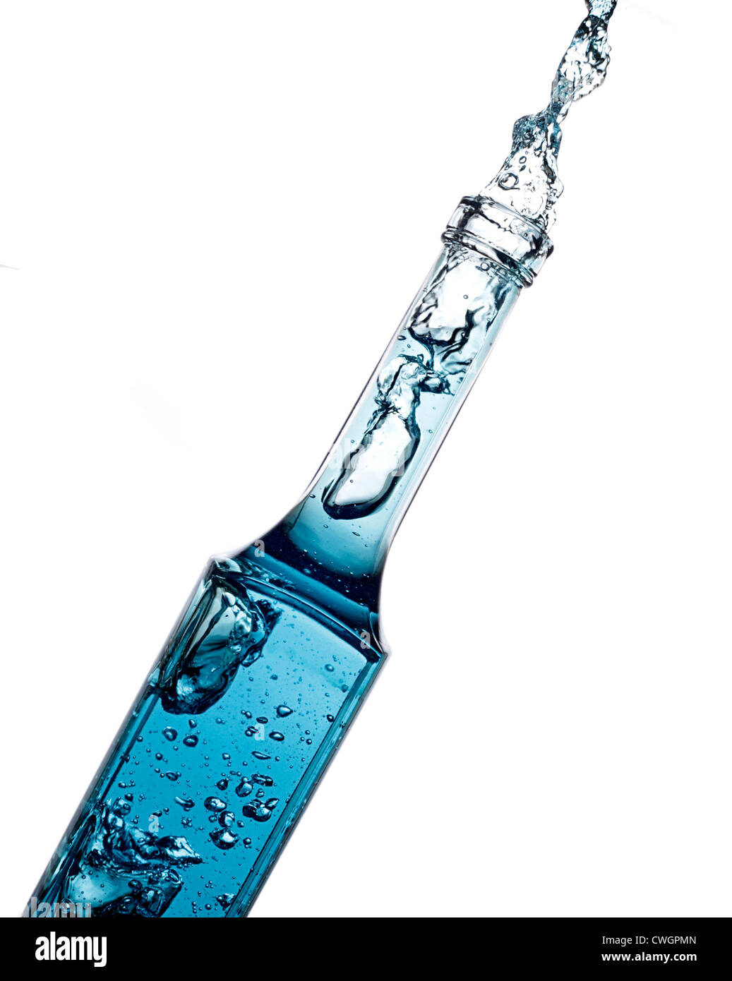 Splashing blue liqueur Stock Photo - Alamy