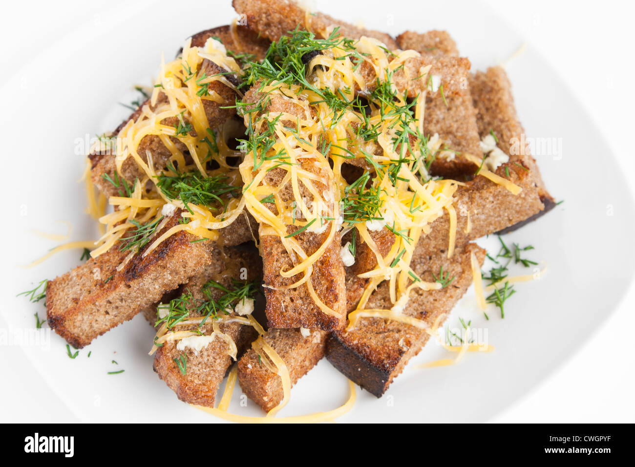 snack roast rusk from bread with cheese and garlic Stock Photo - Alamy