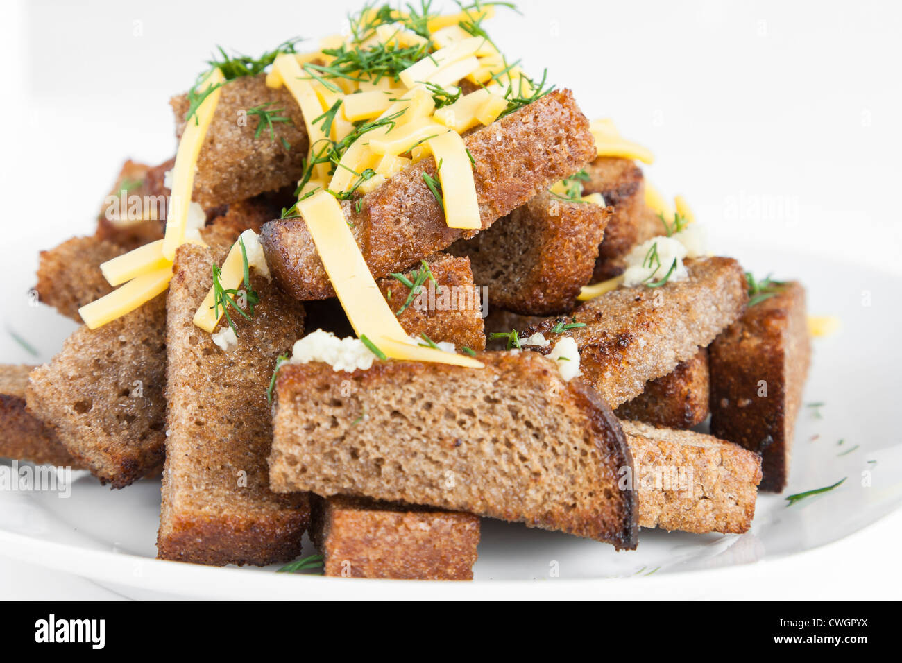snack roast rusk from bread with cheese and garlic Stock Photo - Alamy