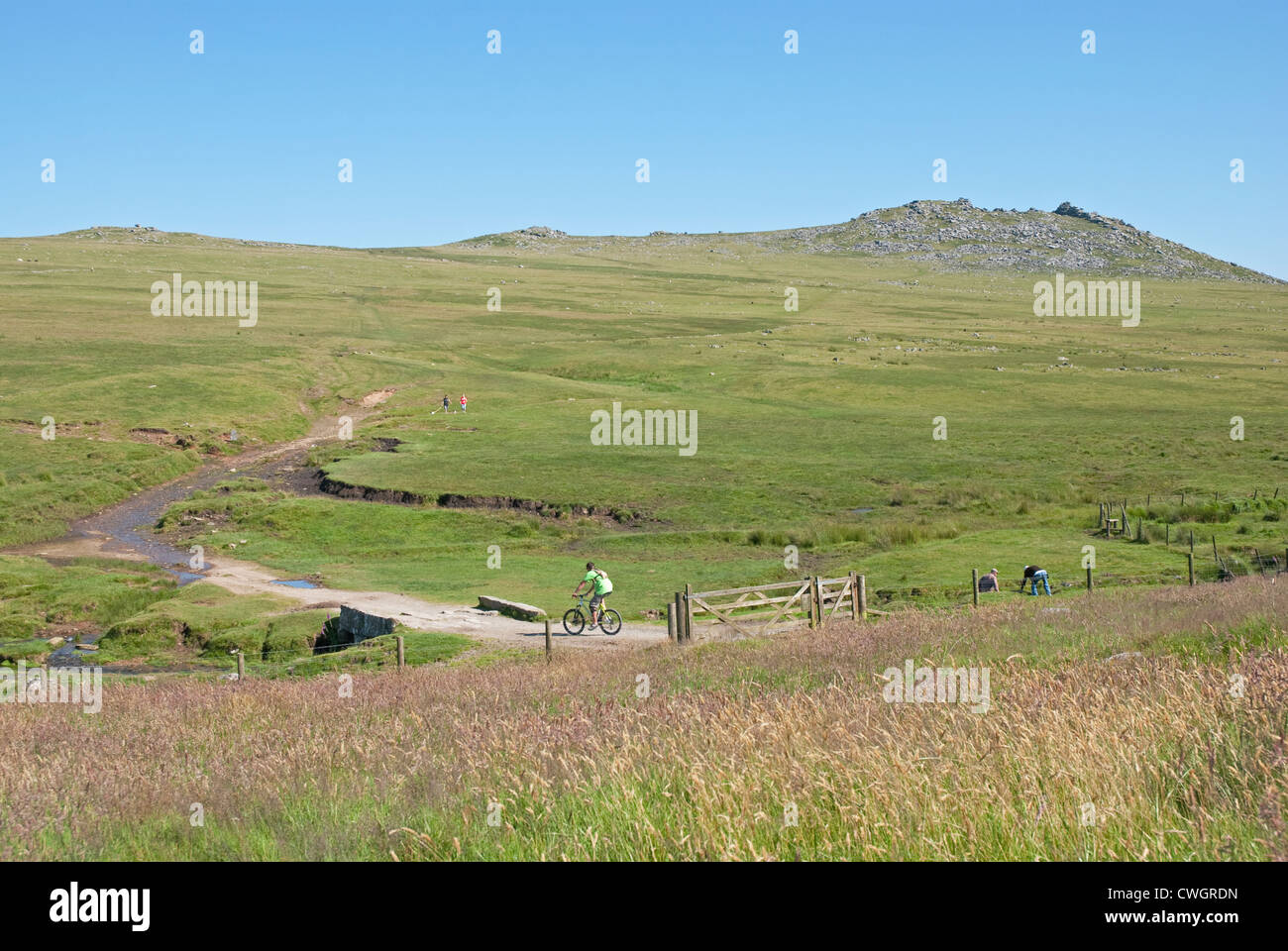 Mountain biker below Roughtor, Cornwall's second highest peak, on ...