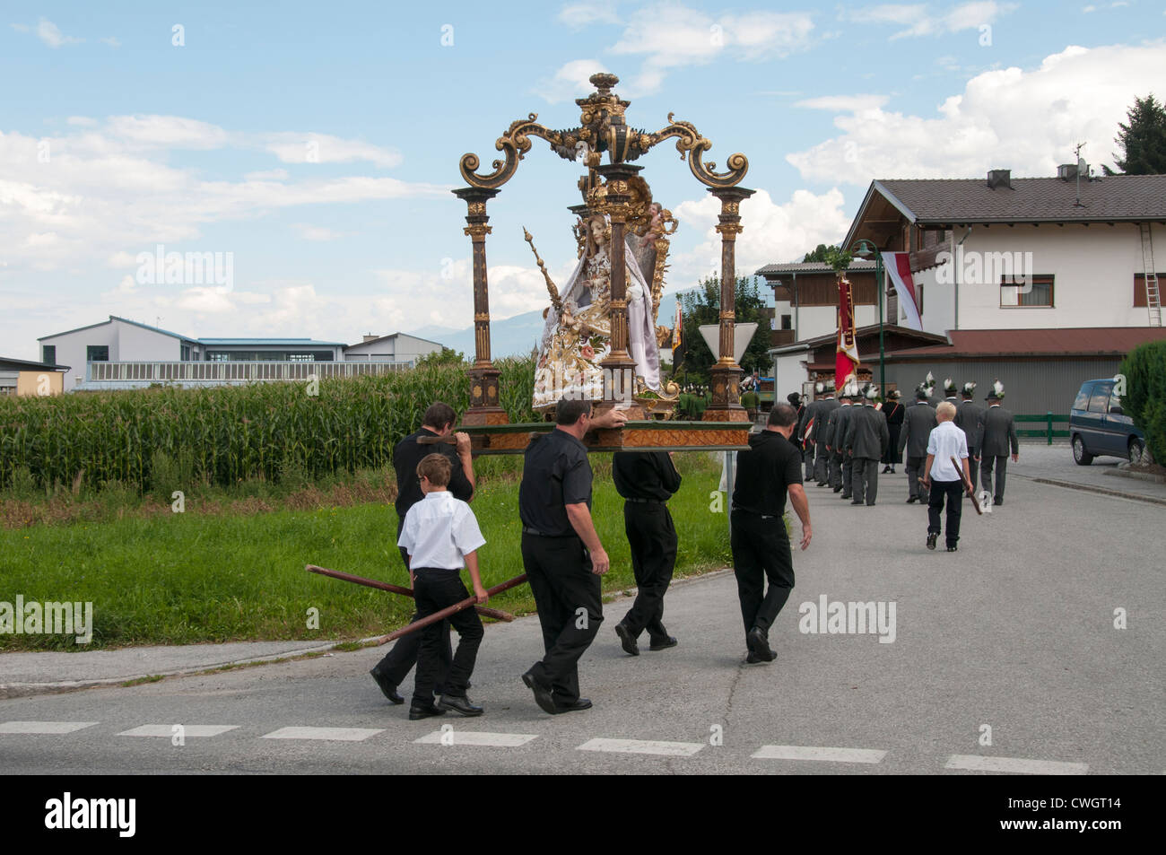 people walking in procession to the church on Maria Ascension Stock ...