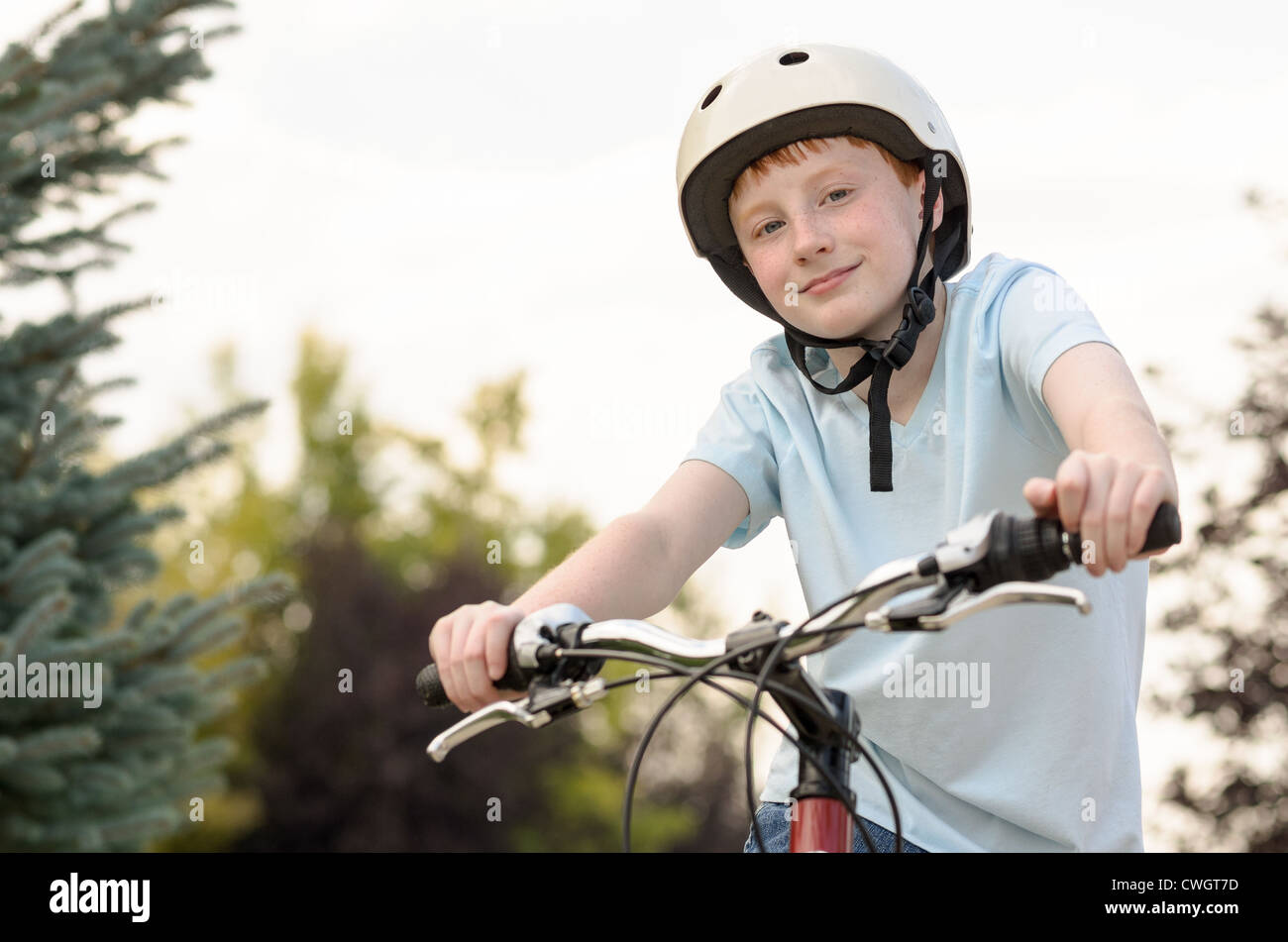 Boy on a bicycle Stock Photo - Alamy