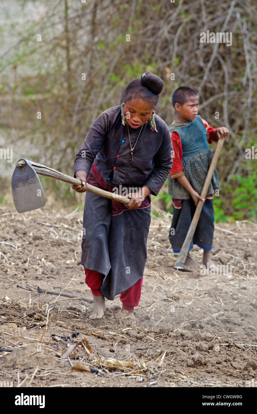 Tribal people farming hi-res stock photography and images - Alamy
