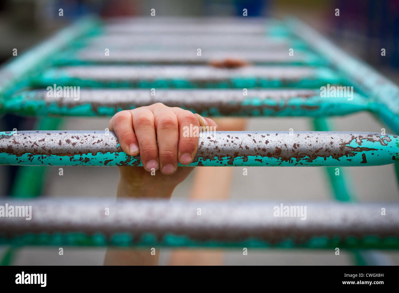 Swinging on monkey bars hi-res stock photography and images - Alamy
