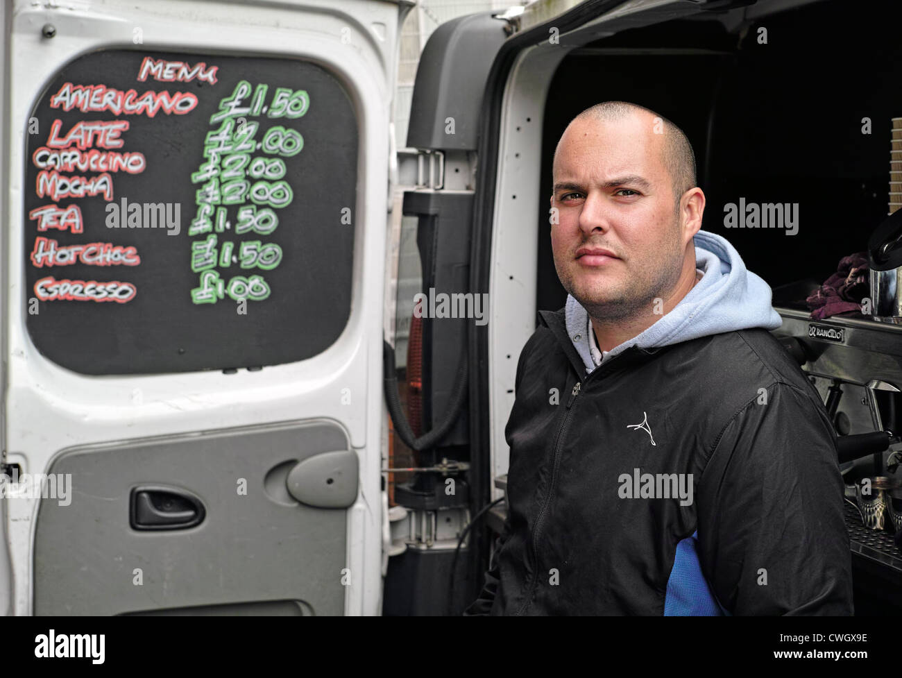 Traveling Coffee salesman. Focus is on man's face Stock Photo - Alamy