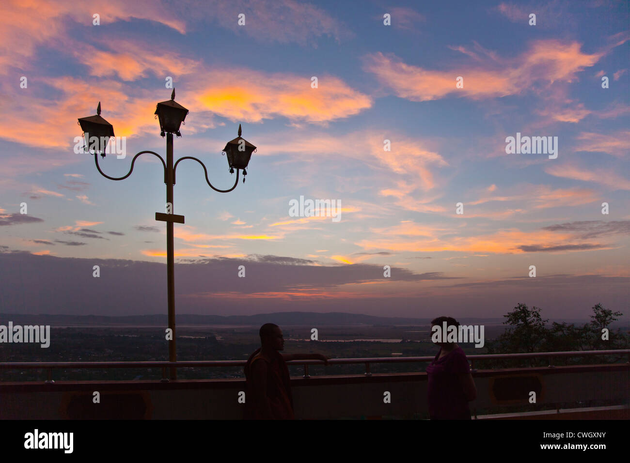 SUNSET atop MANDALAY HILL - MANDALAY, MYANMAR Stock Photo - Alamy
