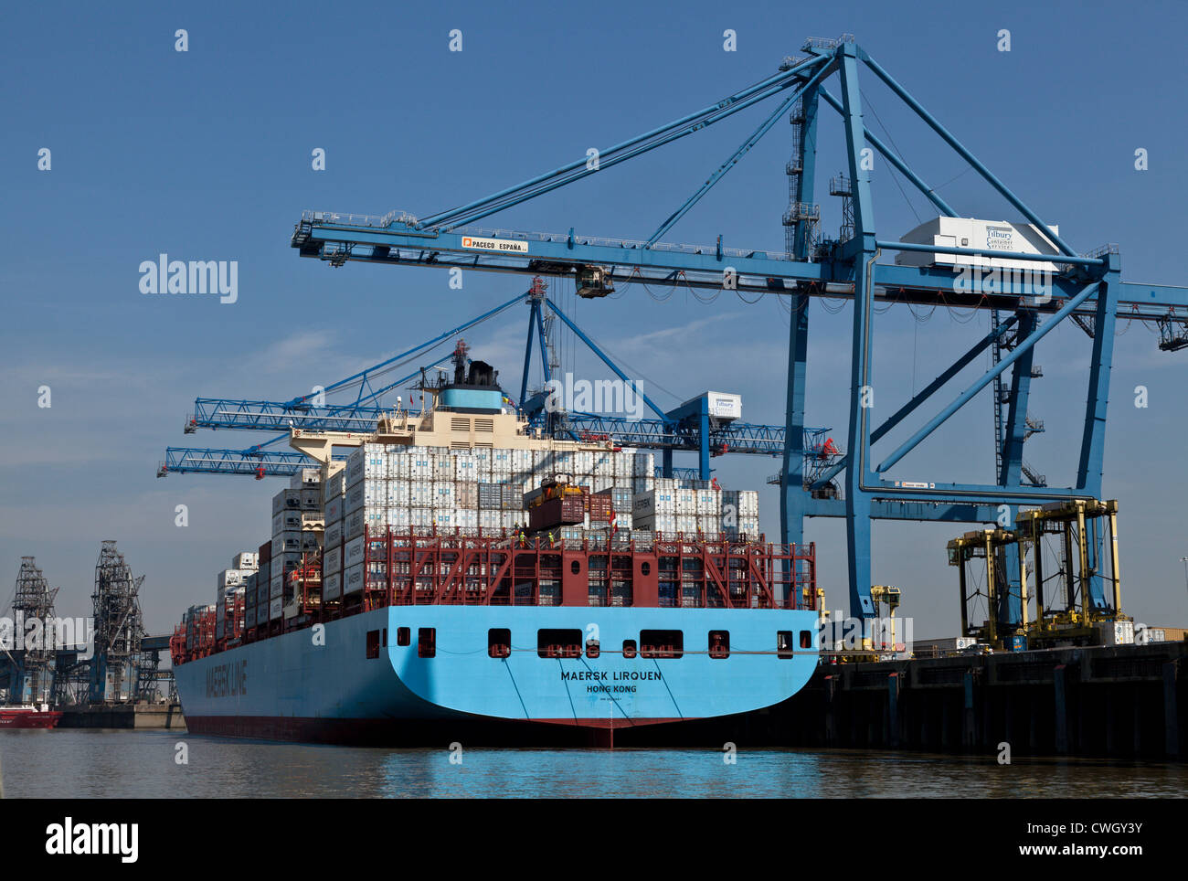 Container ship in port being loaded Stock Photo - Alamy
