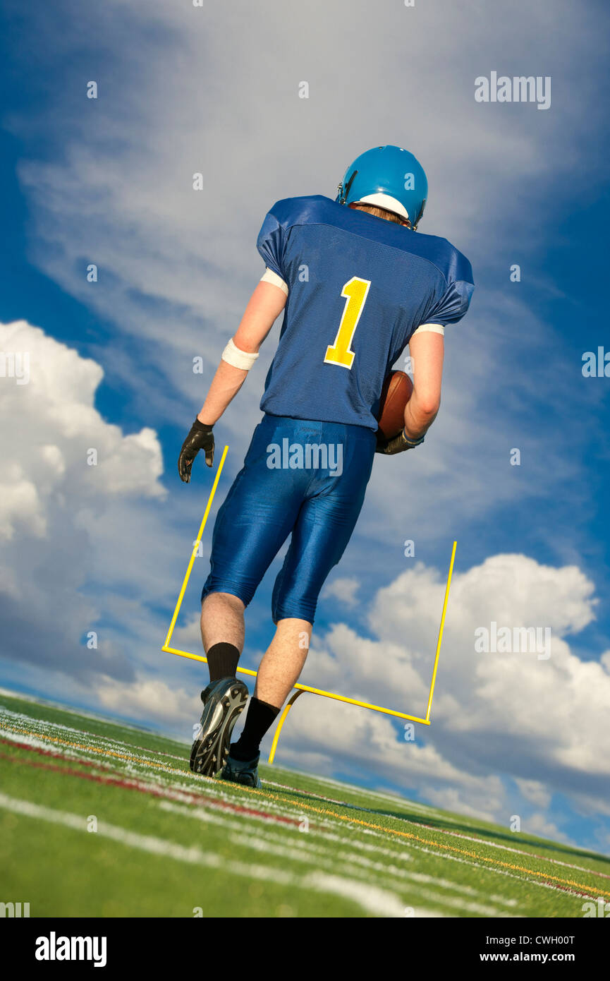 Football player walking hi-res stock photography and images - Alamy