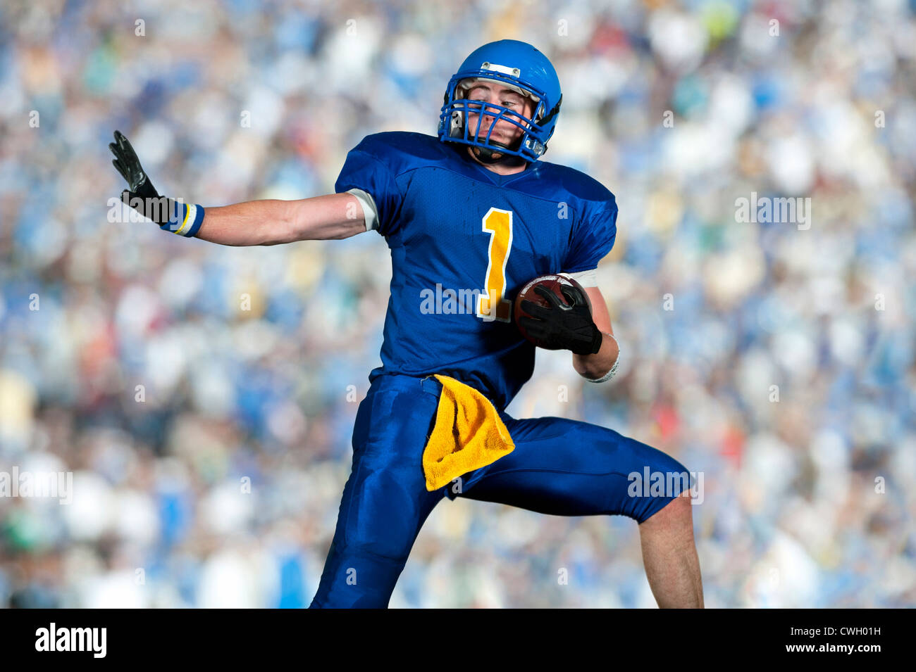 Running the football hi-res stock photography and images - Alamy