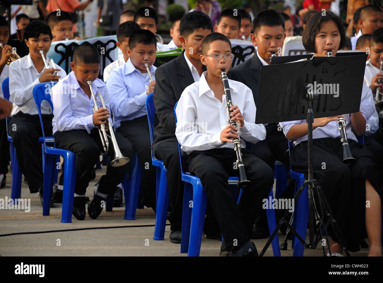 Young traditional thai musicians at the Candle and wax festival(Khao ...