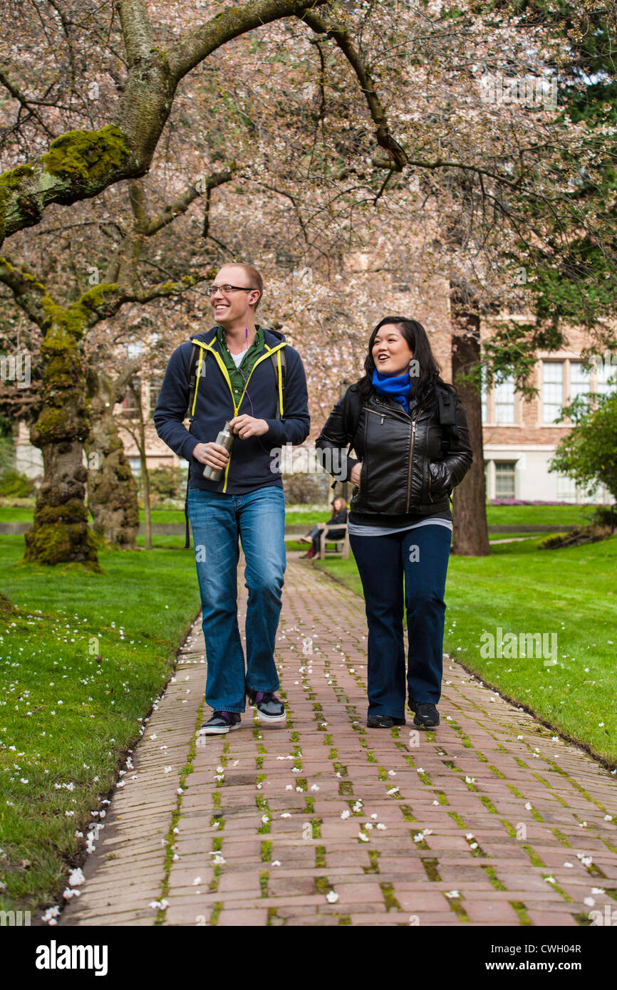 College students walking holding hands hi-res stock photography and ...